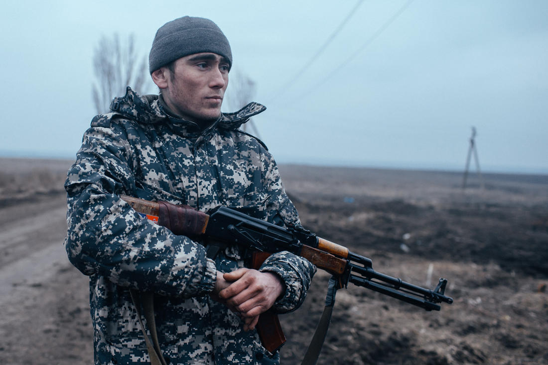 A ceasefire, with Kalashnikovs in hand: A photo series by Max Avdeev from separatist base camps ...